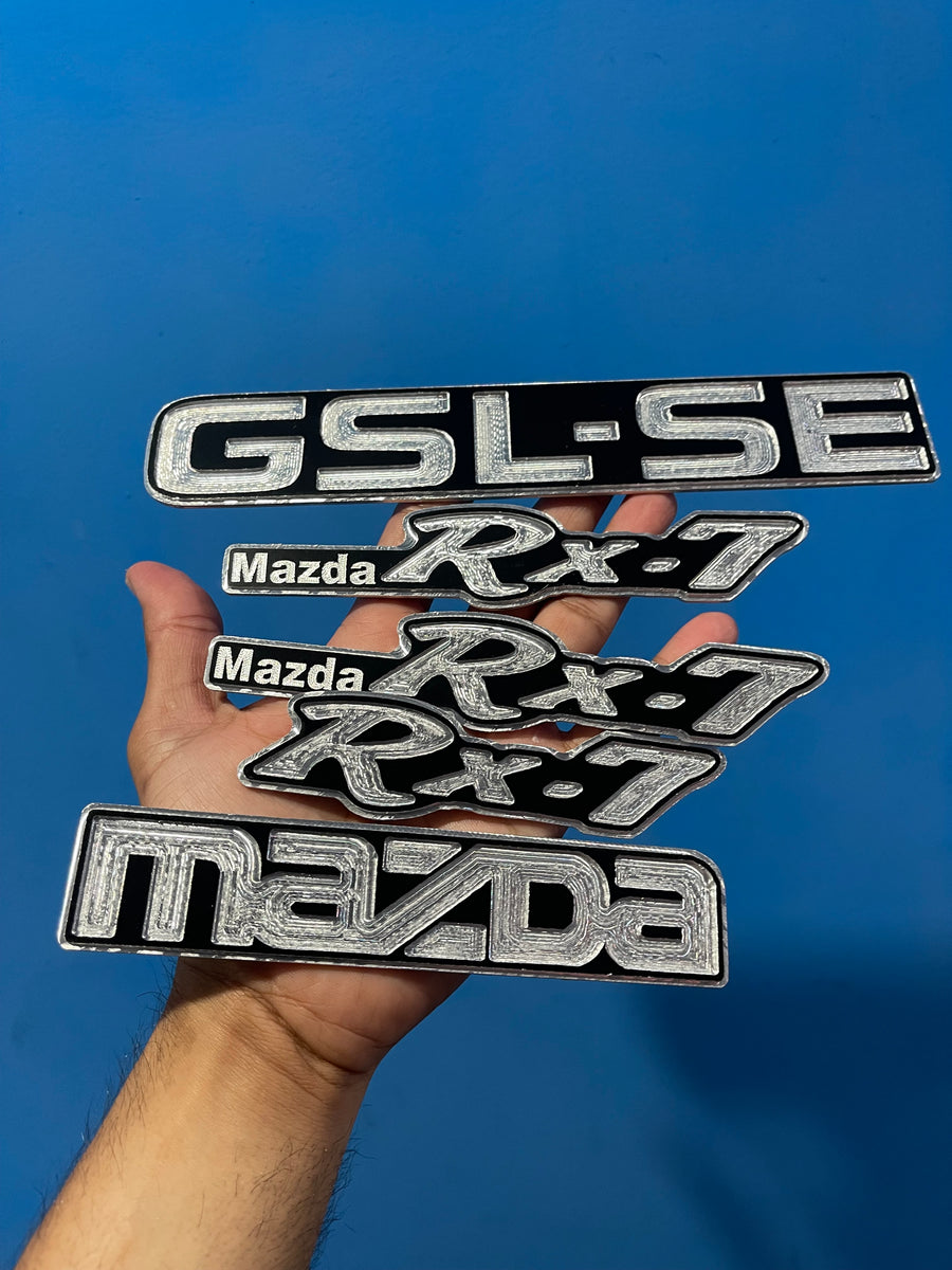 Rx7 79-85 Aluminum Emblems – Breton Performance Engineering